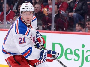 Sather Puts His Skate In His Mouth